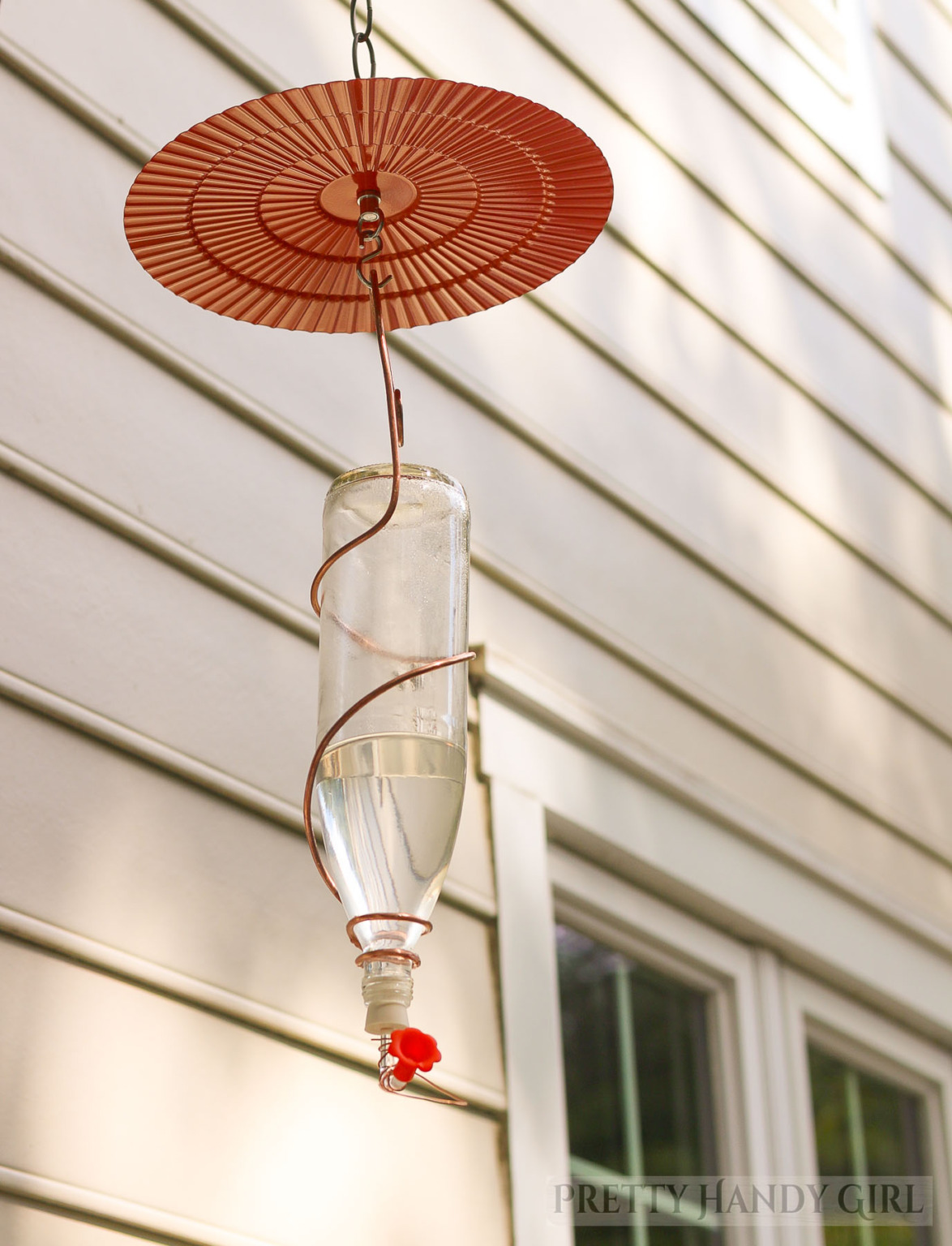 Beautiful DIY Glass Bottle Hummingbird Feeder - Pretty Handy Girl